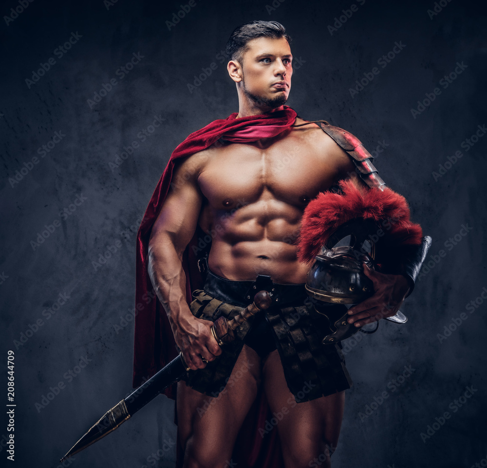Brutal ancient Greece warrior with a muscular body in battle uniforms ...