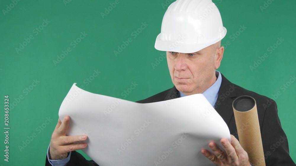 Engineer Reading a Construction Plan with Green Screen in Background ...