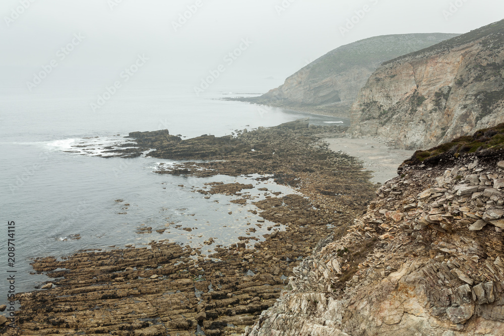 Summer Atlantic rocky coast view Big stony rockfall on precipice shore ...