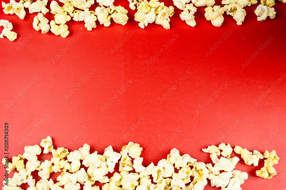 Popcorn on red background. Free space for text and design Stock Photo ...