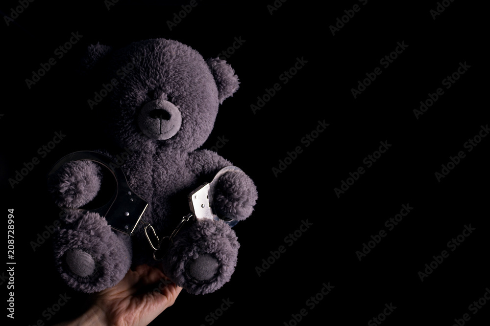 teddy bear in handcuff Stock Photo | Adobe Stock