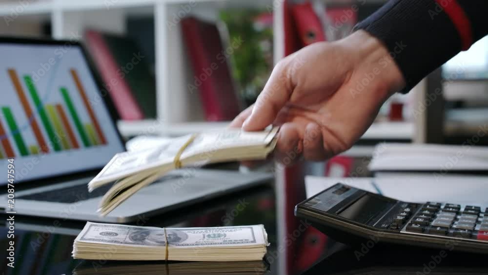Business deal with dollars cash. Transfer bundles of money from hand to ...