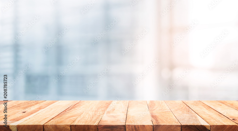 Wood table top on blur white glass window background form office ...