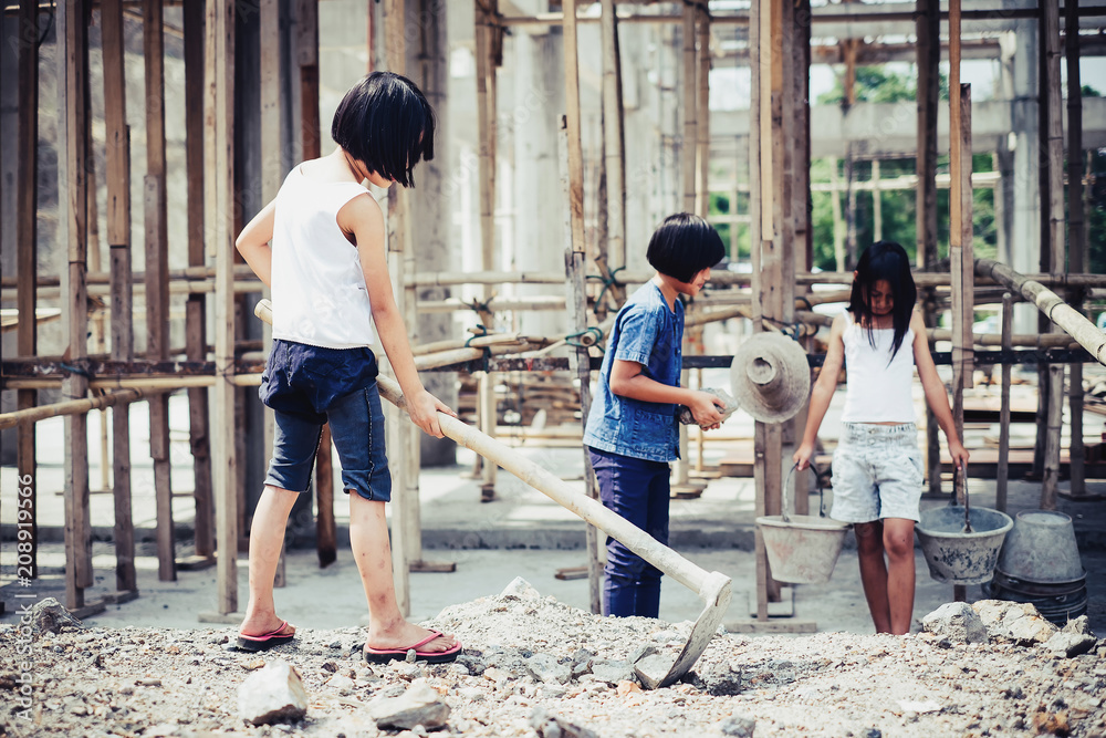 Group of little girl labor working in commercial building structure ...