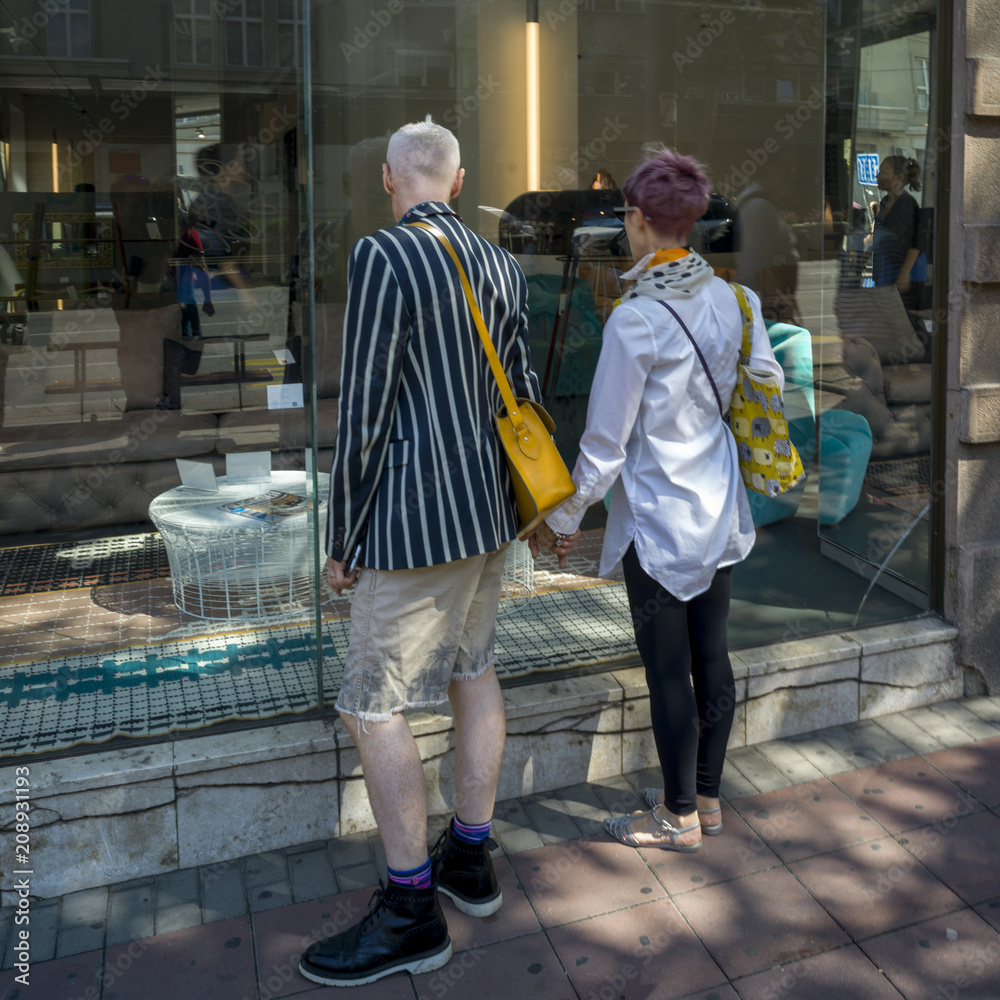 People looking at a store window display, Belgrade, Serbia Stock Photo ...