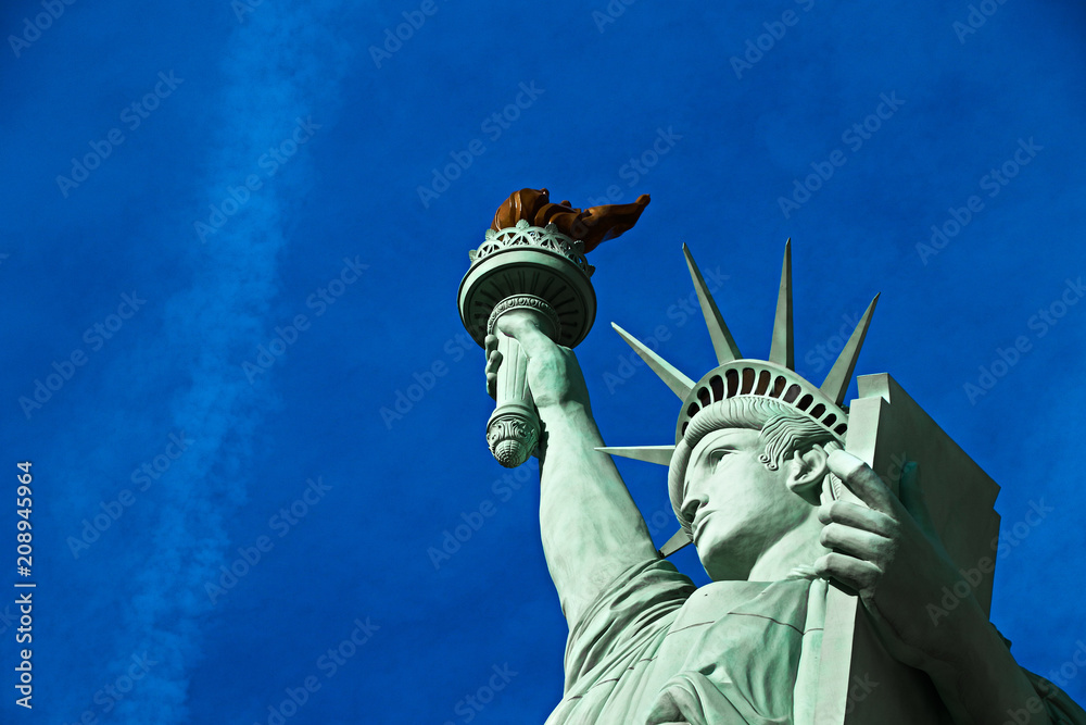 The Statue of Liberty.Blue sky panoramic background with copy space ...
