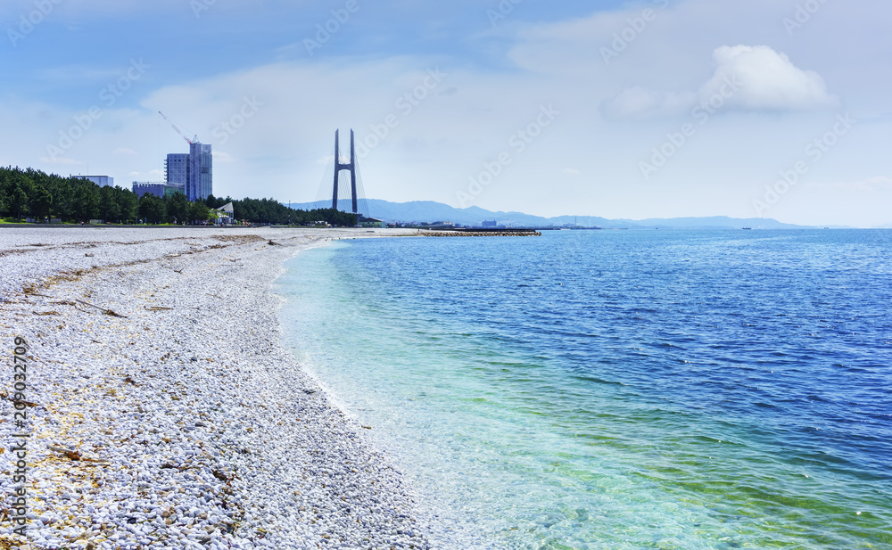 Beautiful artificial marble beach along the shoreline of Rinku Town ...
