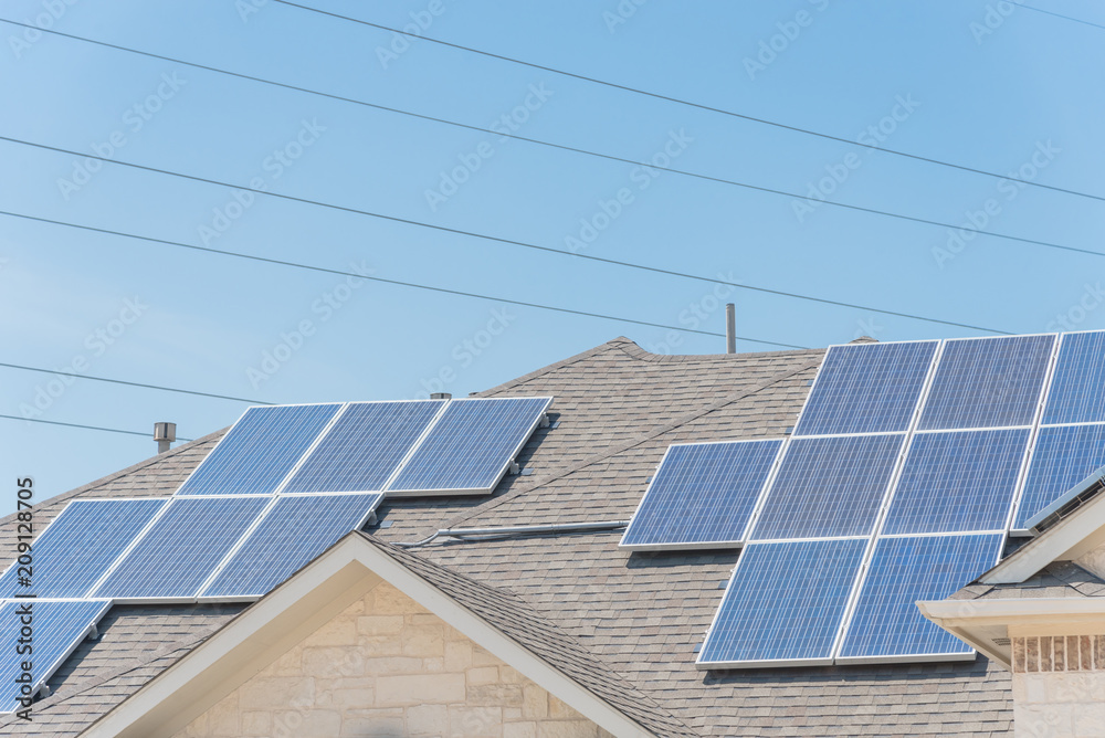 Concept of renewable clean vs. traditional energy. Close-up solar panel ...