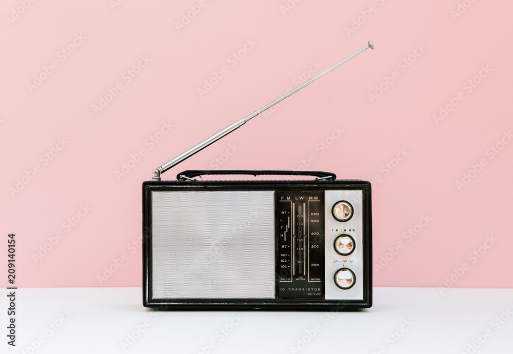 Vintage radio on pink background Stock Photo | Adobe Stock