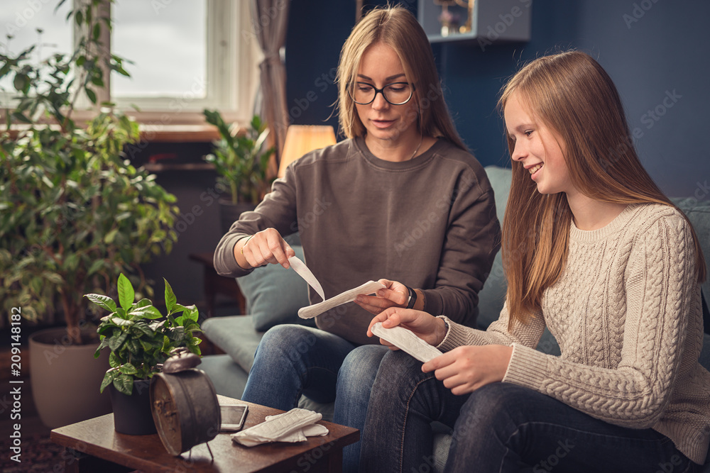 Periods. Menstrual cycle. Mother explains daughter the menstrual cycle ...