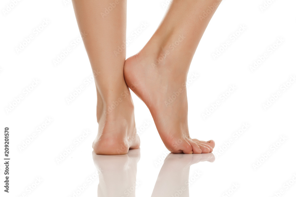 beautifully groomed bare feet on white background Stock Photo | Adobe Stock