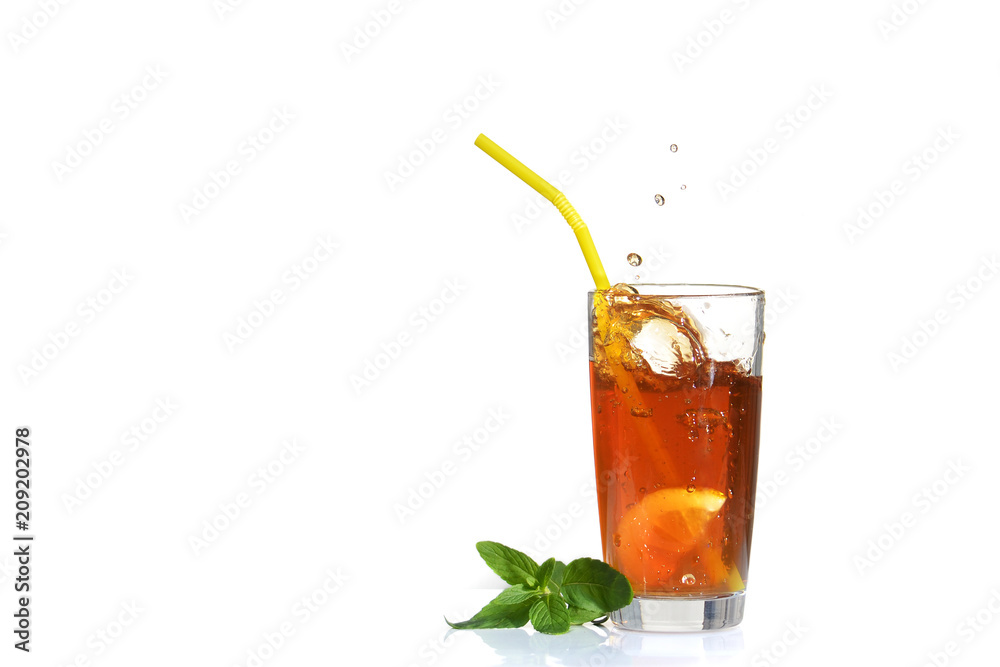 Splashes of iced tea from lemon slice on white isolated background ...