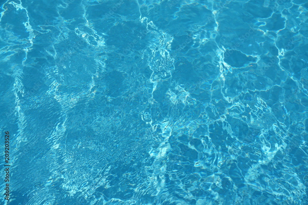 surface of blue swimming pool,background of water in swimming pool ...