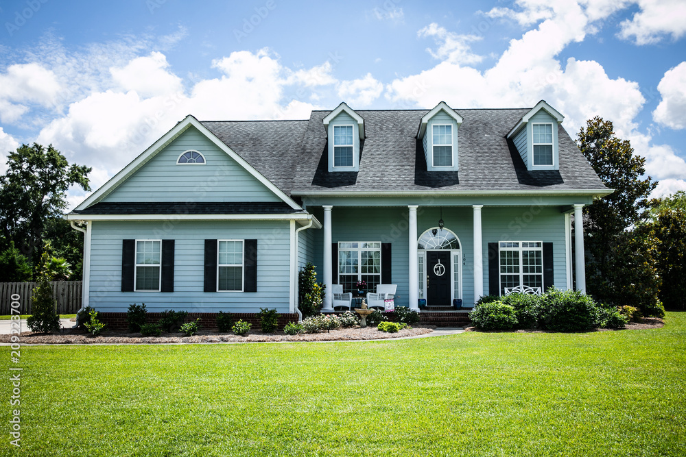 Blue Traditional Siding House Home in Suburbs Front Facing with Curb ...