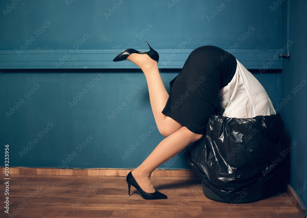 Woman Trying To Get Her Head Out Of Garbage Basket Lady Dressed In Business Casual Clothes Got