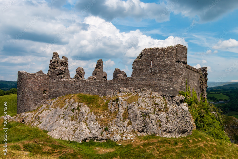 Imposing exterior walls of an ancient ruined castle (Carreg Cennen ...
