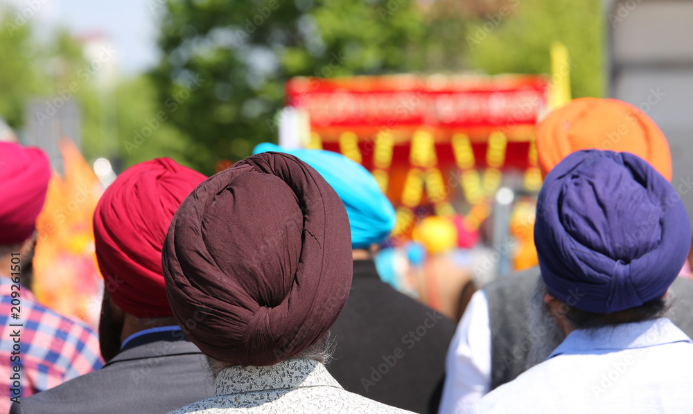 Sikh ethnic men wear colorful turbans to cover their hair Stock Photo ...