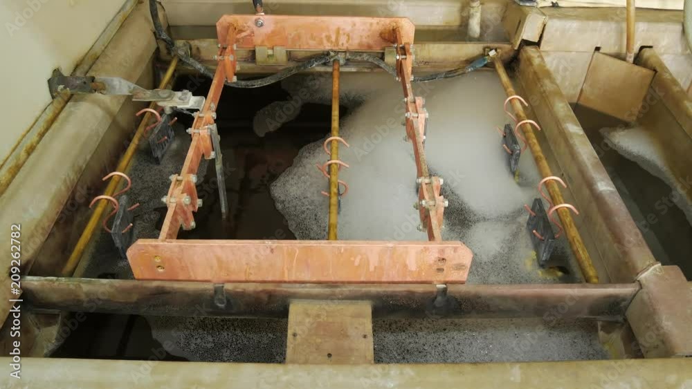 Galvanic bath, Engineering production. Circuit board in galvanic bath ...