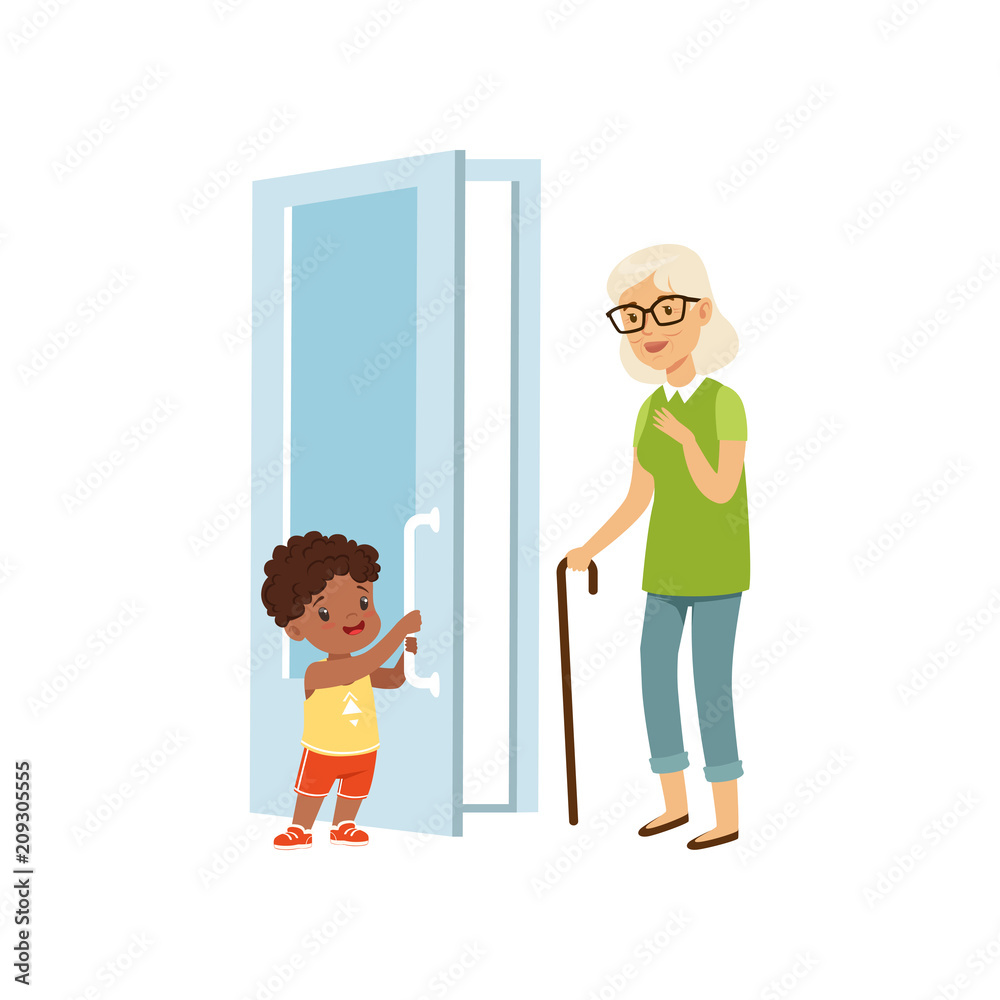 Boy opening the door to an elderly woman, kids good manners concept ...