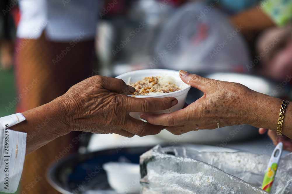 Rich people give food to the poor. starvation concept Stock Photo ...