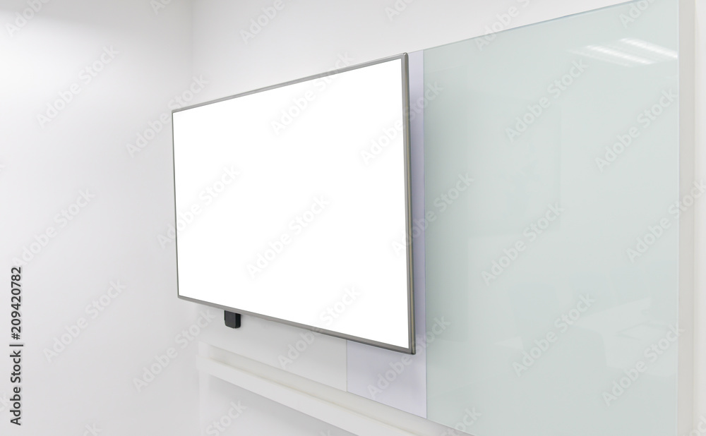 Mock up of LED TV installed to the white wall of the meeting room with ...