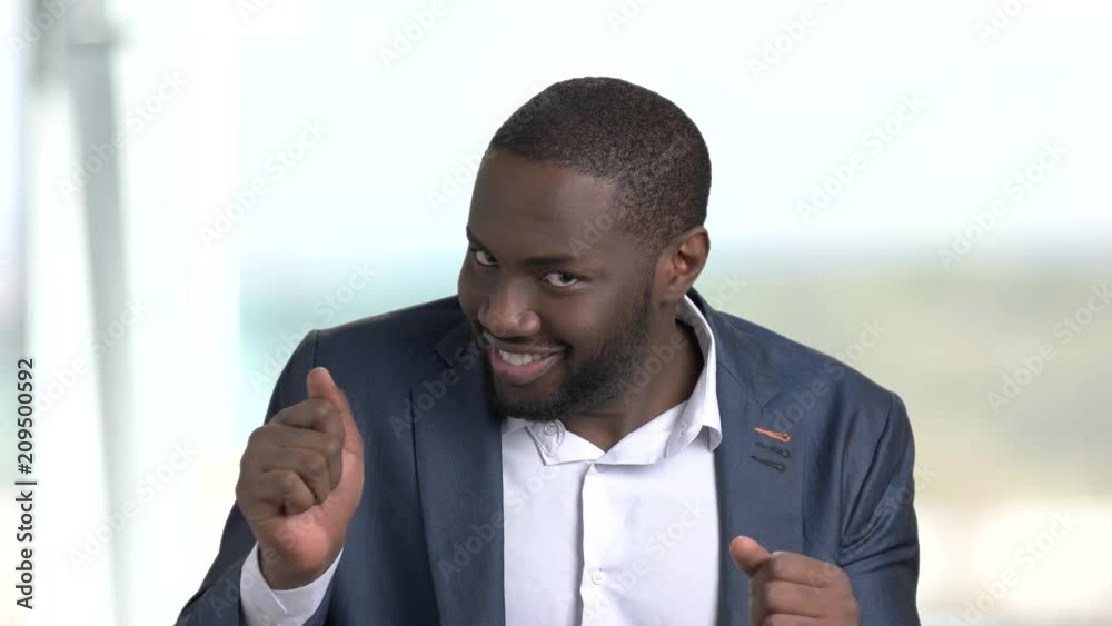 Funny man in business suit on blurred background. Handsome african ...