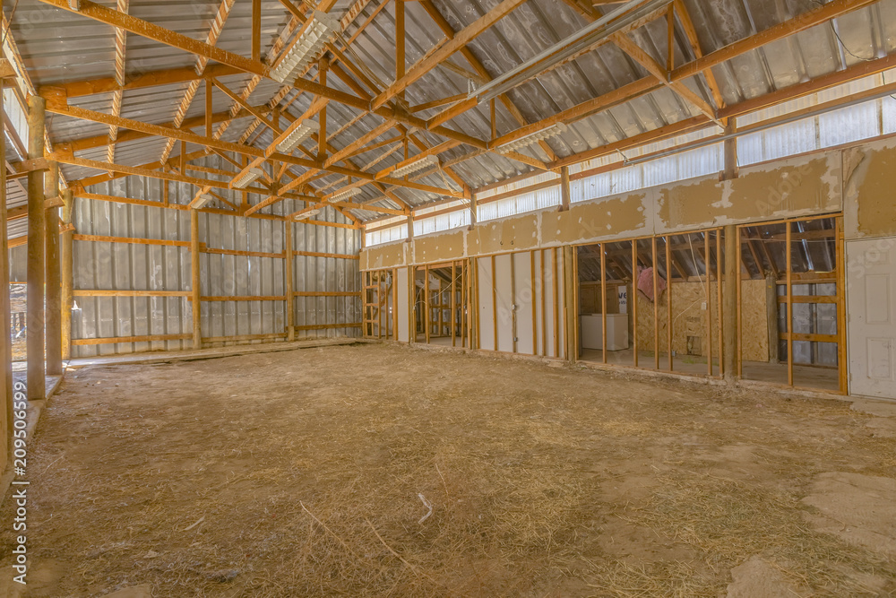 Interior of empty barn wooden beams Stock Photo | Adobe Stock