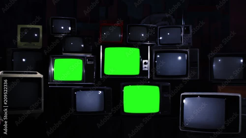 Many Tvs With Green Screens Turning On. Zoom In. Blue Steel Tone. You ...