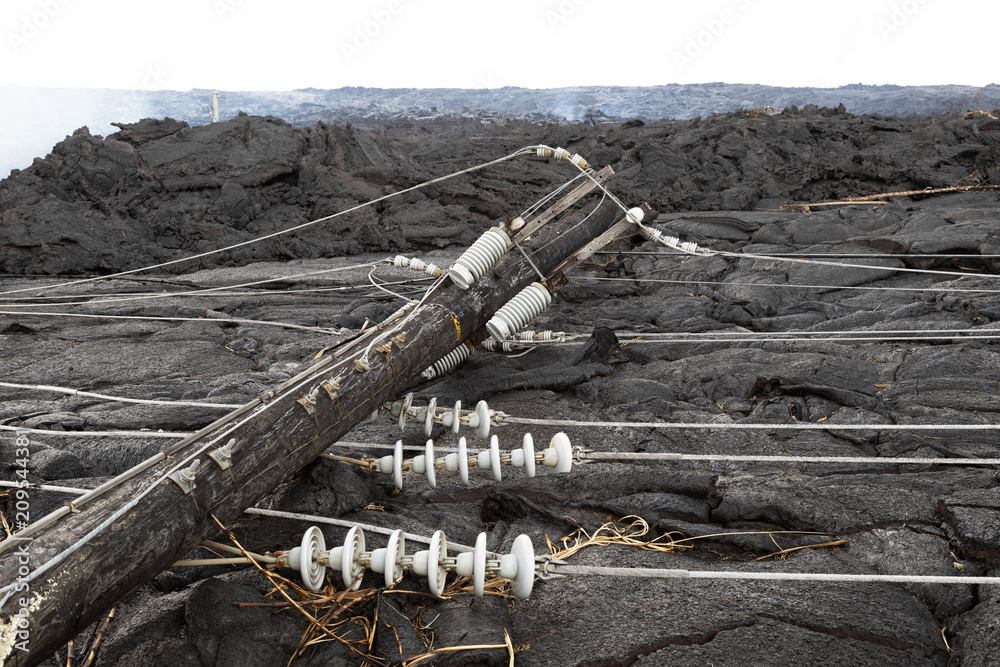 High voltage power line destroyed by a lava flow in Hawaii Stock Photo ...