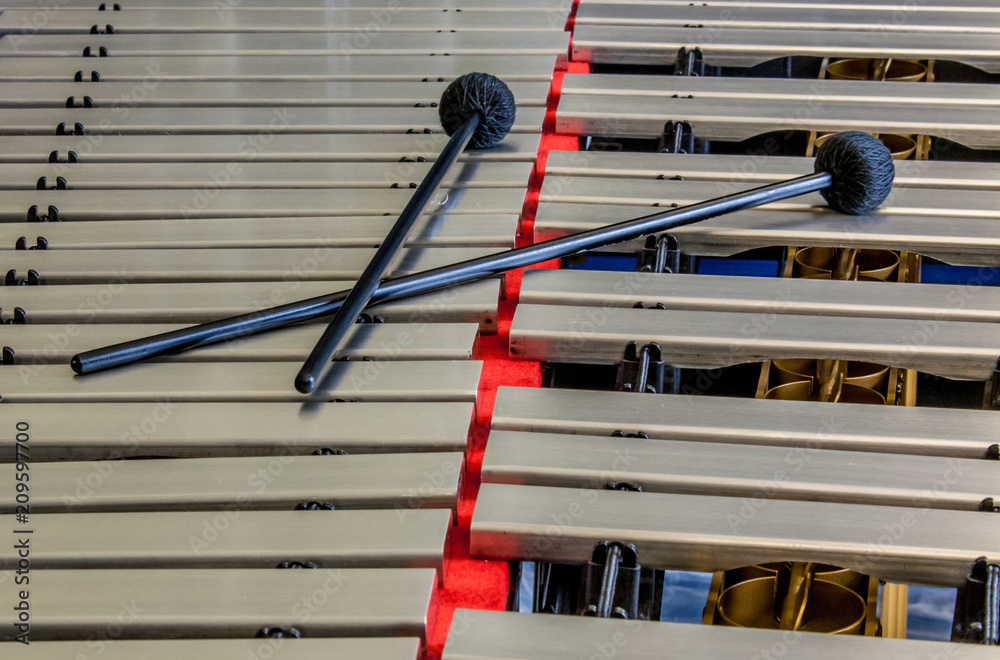 Sticks laying on top of a vibraphone musical instrument Stock Photo ...
