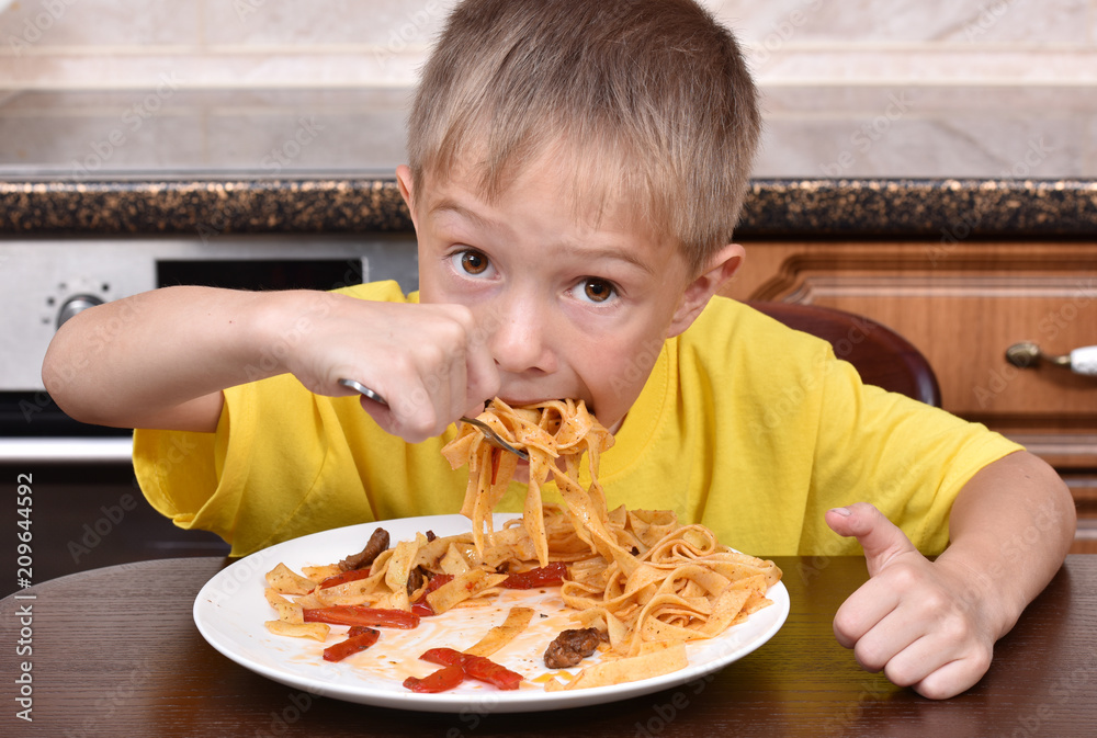 Kid Eating Pasta