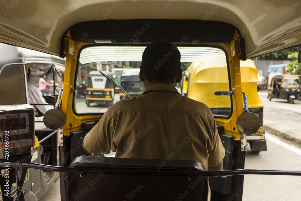 View from the inside of an auto-rickshaw as a passenger in Mumbai ...
