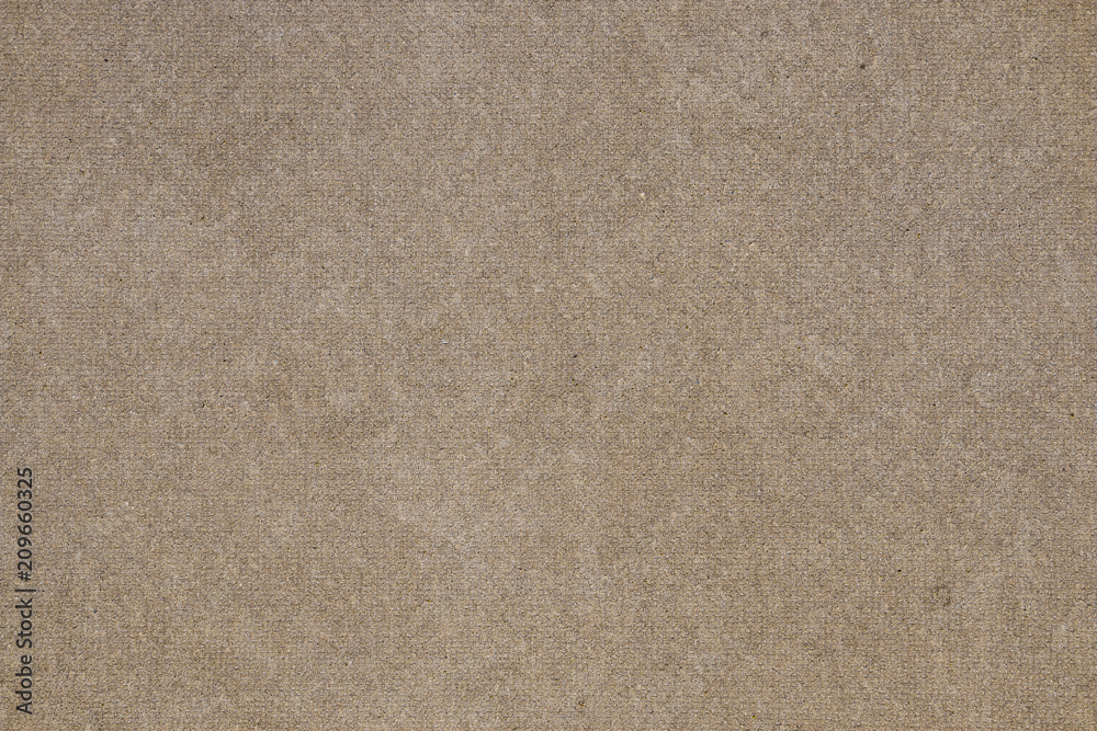 Brown concrete floor texture with small dash pattern. Close-up photo of ...