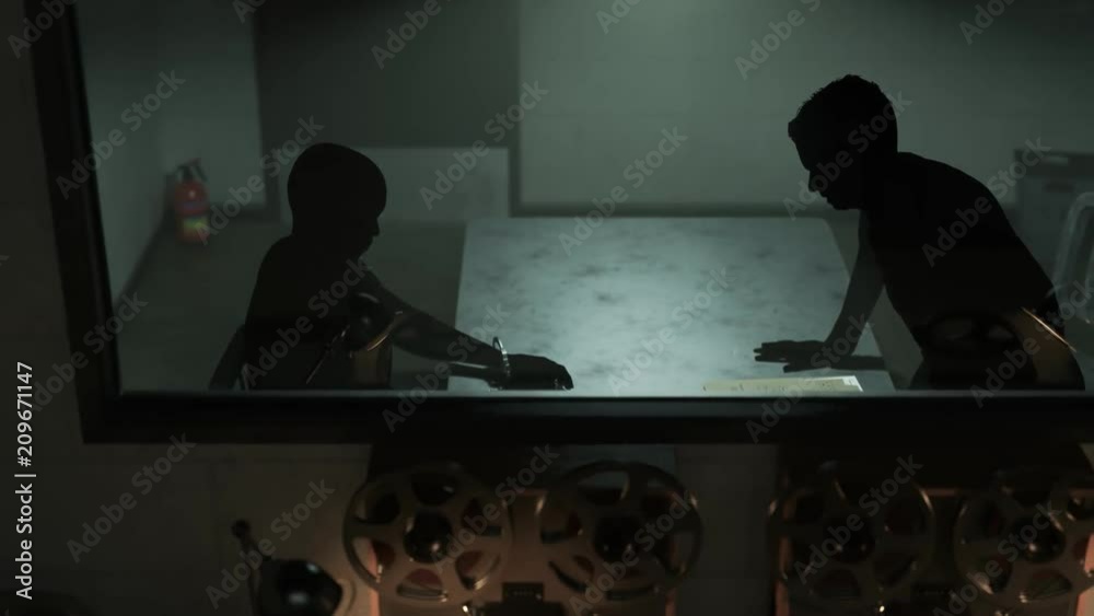 Interrogation room behind one-way mirror glass. Police detective ...