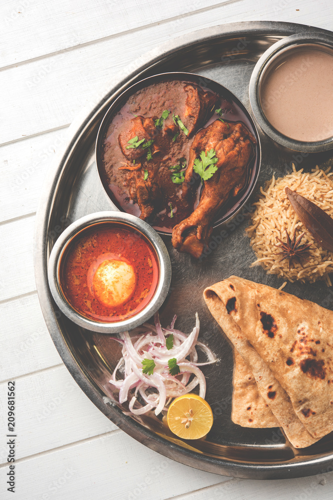 Kolhapuri chicken Thali is a popular Indian/asian food platter consists ...