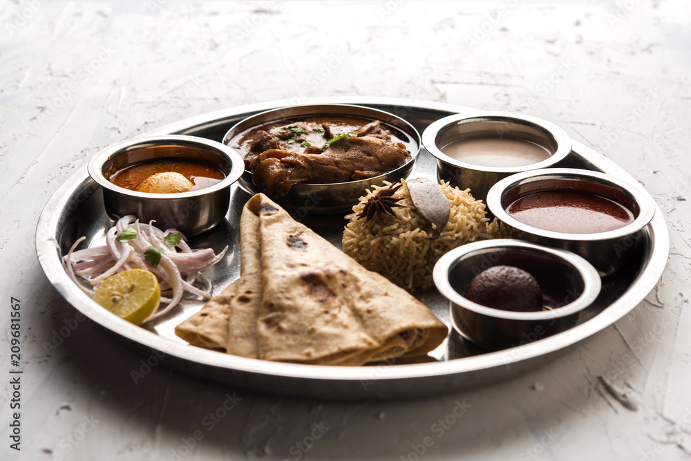 Kolhapuri chicken Thali is a popular Indian/asian food platter consists ...