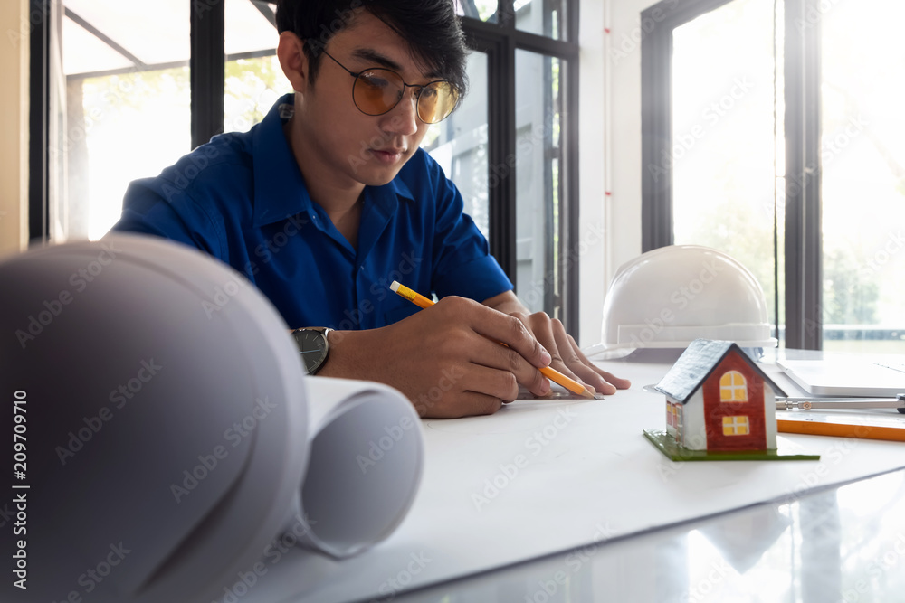 Architect man working drawing construction on blueprints, engineer ...