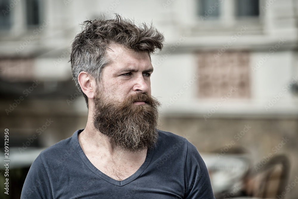 Sadness and problems concept. Man with beard and mustache looks not ...