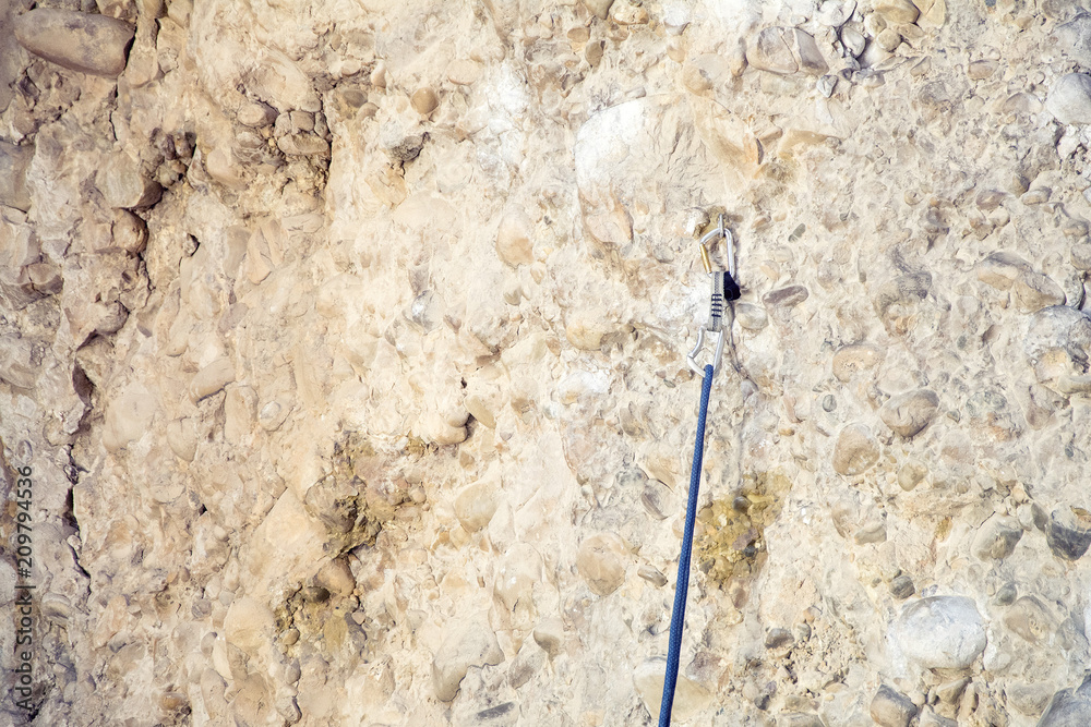 rock climbing gear and clip on rock wall at maple canyon utah which is ...