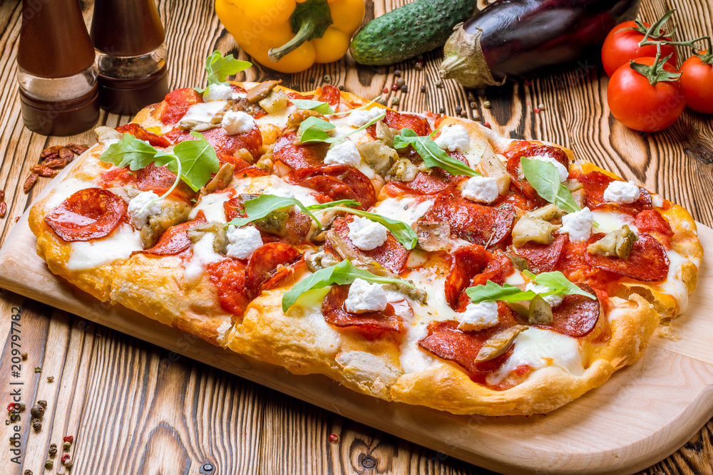 Pepperoni pizza at the Rome dough Stock Photo | Adobe Stock