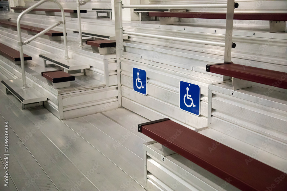 Handicapped seating among metal bleachers at an arena Stock Photo ...