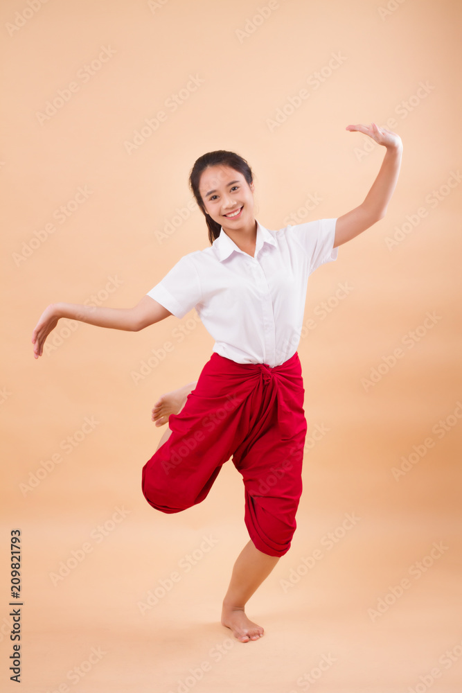 Thai performance art, woman dancer student dancing in traditional red ...