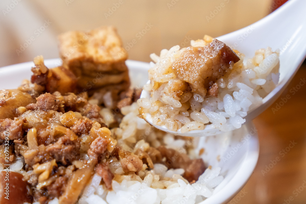 Taiwan famous food - Braised pork and fried tofu on rice. Soy-stewed ...