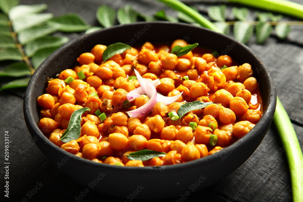 Famous Indian channa masala.chick pea curry. Stock Photo | Adobe Stock