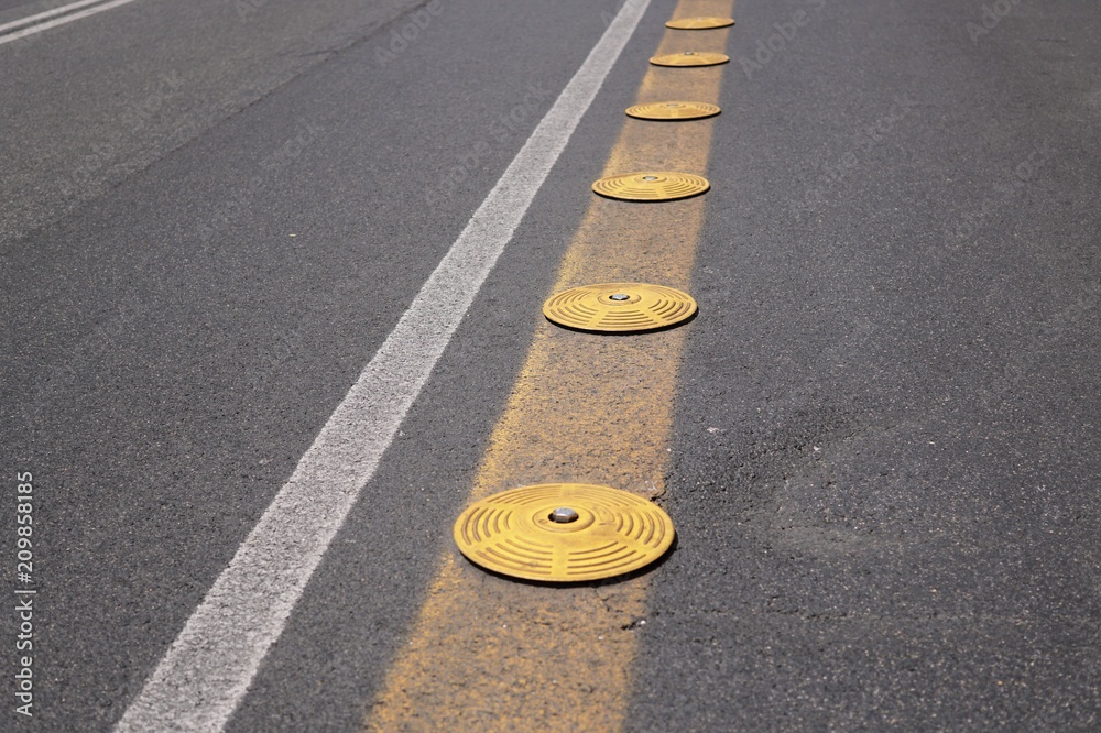Traffic separators of medians Stock Photo | Adobe Stock