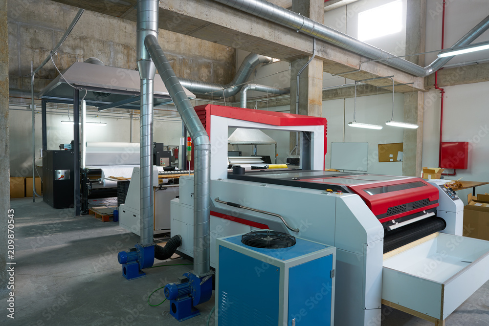Laser cutting machine for textile transfer industry Stock Photo | Adobe ...