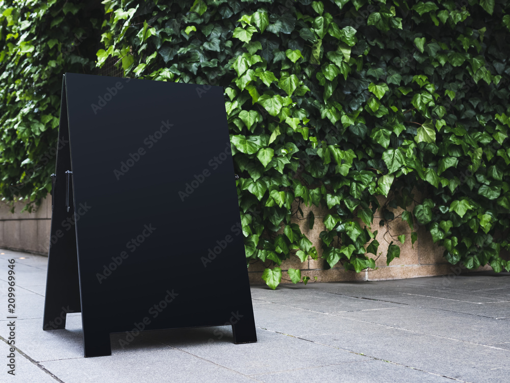 Blank Board stand mock up Black Signage Outdoor green garden background ...
