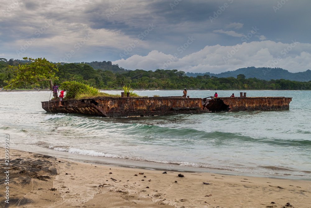 PUERTO VIEJO DE TALAMANCA, COSTA RICA - MAY 16: People on a rusty ...