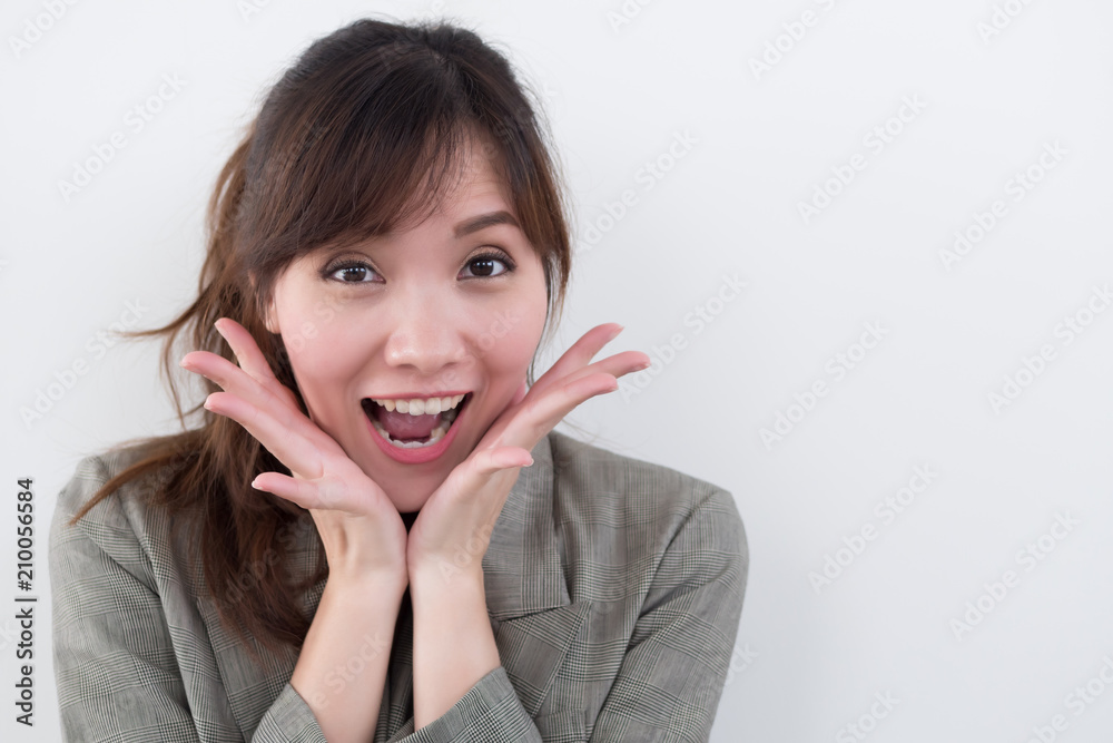 excited woman shouting, screaming with surprise and interest; portrait ...