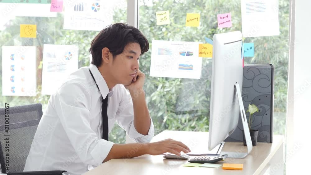 Businessman boring when he work at office. Bored asian male office ...